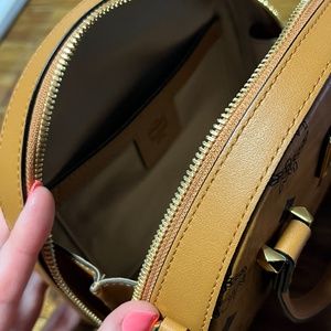 MCM | Bags | Rare Mcm Signature Cognac Diamond Logo Leather Mini Round ...